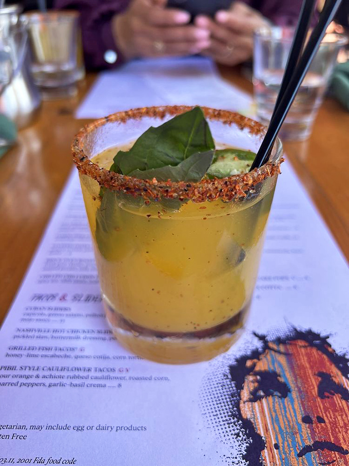 A cocktail with attitude&mdash;spicy rim, fresh basil, and enough personality to be the life of your table's party.