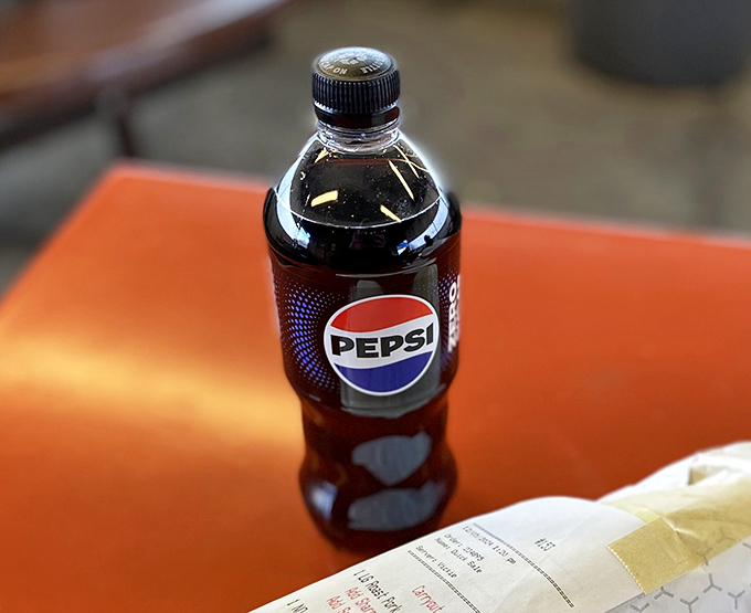 The classic companion to sandwich perfection. That Pepsi isn't just a beverage—it's a palate cleanser between bites of culinary history.