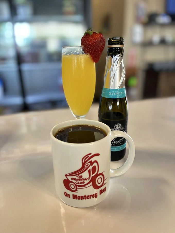 Morning mimosas and coffee in their signature mug. The breakfast equivalent of wearing both a belt and suspenders - deliciously redundant.