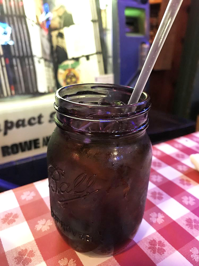 Sweet tea served in a Mason jar&mdash;because in Texas, proper hydration comes with a side of nostalgia and enough sugar to fuel a cattle drive.