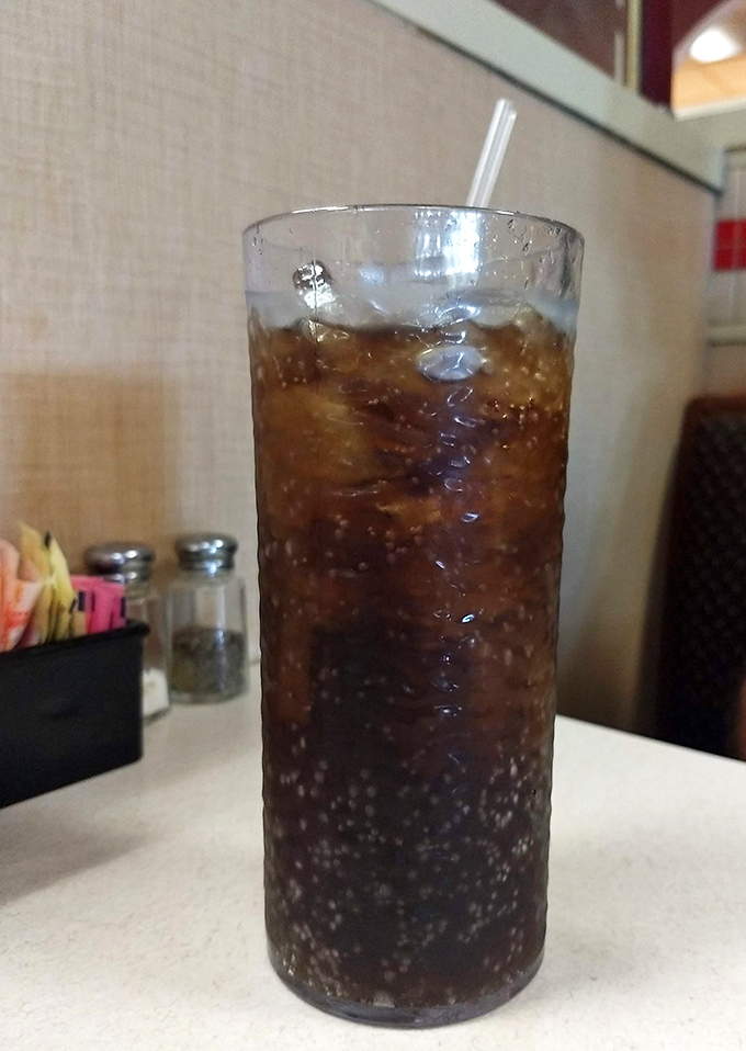 That tall glass of cola isn't just a beverage&mdash;it's the perfect companion for cutting through rich comfort food, bubbles dancing all the way down.