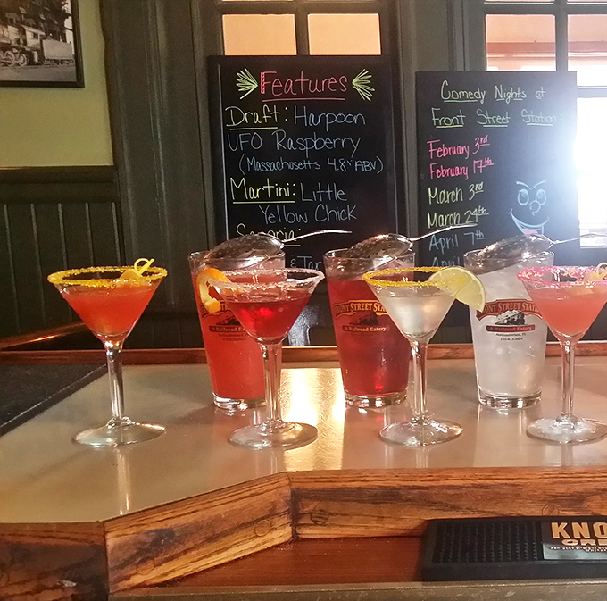 Cocktail artistry on display. These vibrant martinis aren't just drinks; they're liquid conversation starters that complement the railroad journey perfectly.