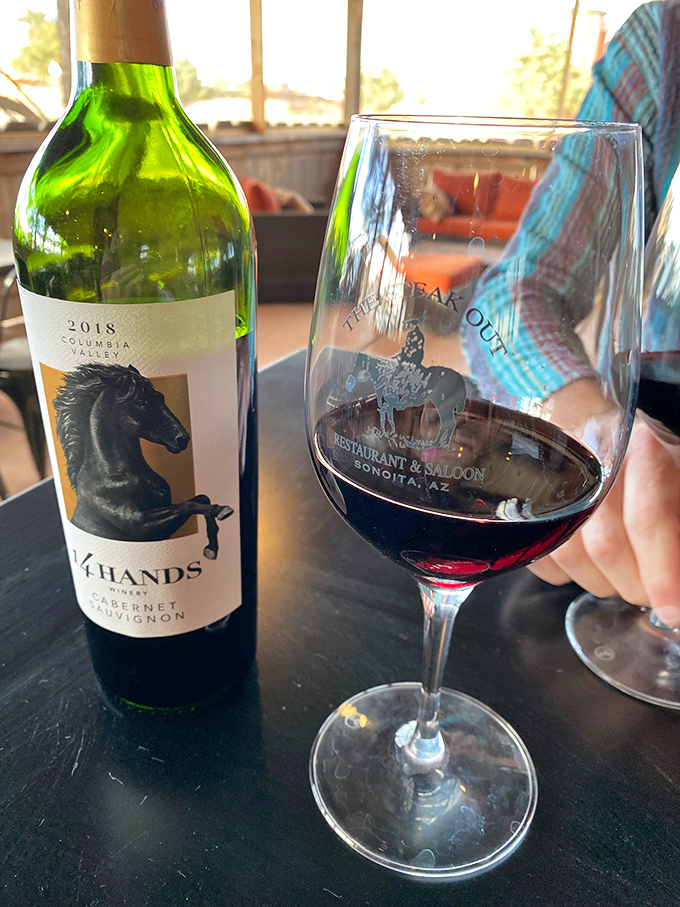 Wine country meets cattle country in a glass. The etched logo tells you you're somewhere special, while the deep red promises a perfect pairing.