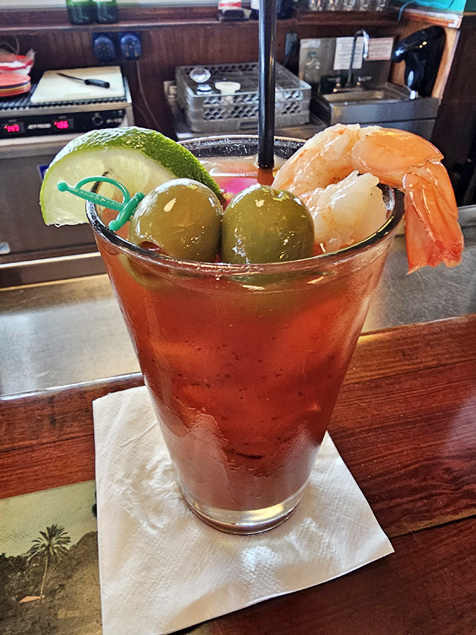 That Bloody Mary comes dressed to impress with enough garnishes to qualify as a small seafood appetizer.