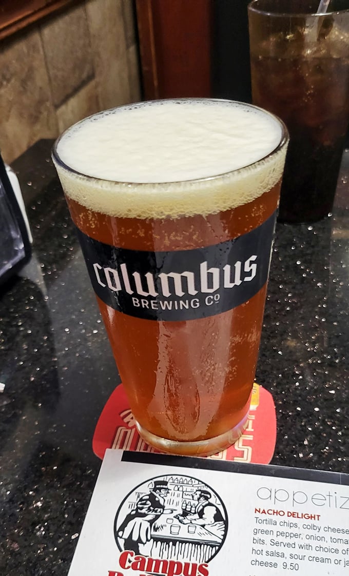 Beer and breadsticks: a match made in Ohio heaven. This Columbus Brewing Company pint stands ready to wash down whatever cheesy delight you've ordered.