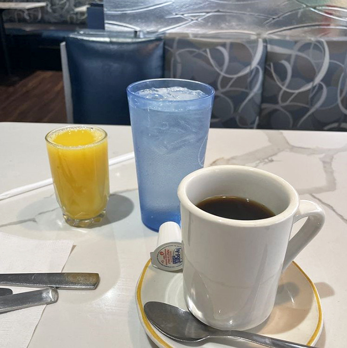 Morning essentials: fresh-squeezed orange juice, ice water, and coffee that keeps coming until you've solved all the world's problems.