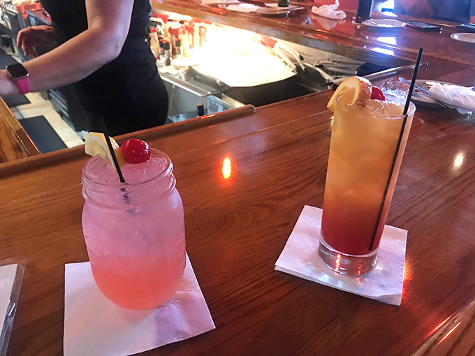 Colorful cocktails that promise vacation vibes with every sip &ndash; because nothing says "I'm officially relaxing" like a drink garnished with fruit.