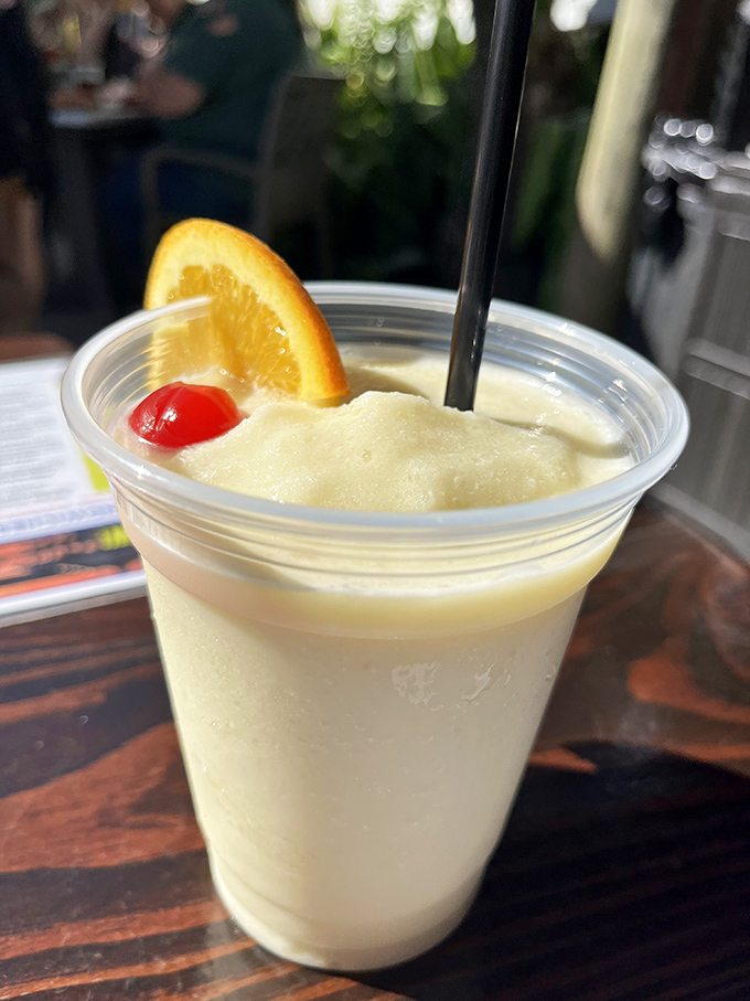 That pi&ntilde;a colada isn't just a drink&mdash;it's vacation in a cup, complete with the mandatory cherry and orange slice.