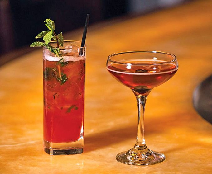 Cocktails that dress better than most people at formal events. That mint garnish isn't just decoration—it's a fashion statement.