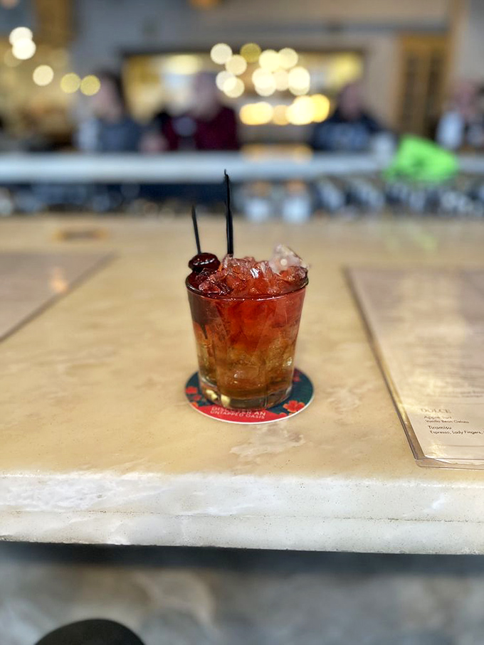 A well-crafted cocktail is like a supporting actor that steals the show &ndash; this ruby-hued creation garnished with cherries promises to do exactly that.