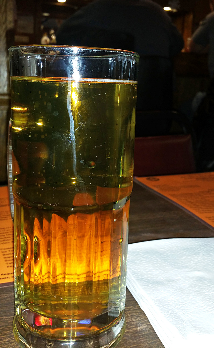 Beer served in glasses tall enough to double as workout equipment. Hydration with benefits.