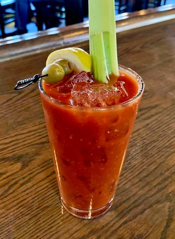 A Bloody Mary that's practically a meal, armed with celery, olives, and enough spice to wake you up faster than your morning coffee ever could.