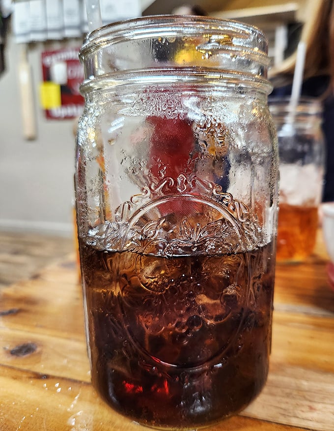 Sweet tea served in a Mason jar &ndash; because in the Ozarks, proper hydration comes with a side of Southern tradition and nostalgic glassware.