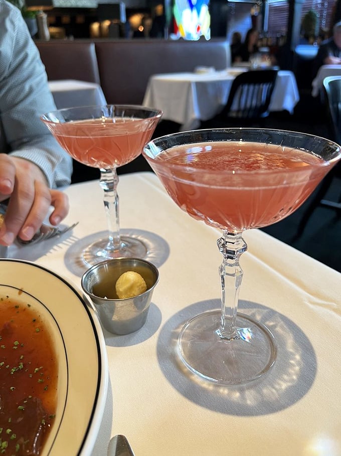 Cocktails the color of a Michigan sunset, served in glasses that make you sit up straighter. Grown-up pleasures in their natural habitat.