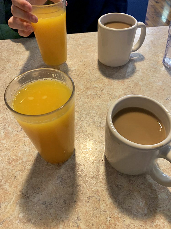 Morning fuel station: where orange juice brings vitamin C and coffee delivers the will to face humanity. The breakfast beverage power couple.