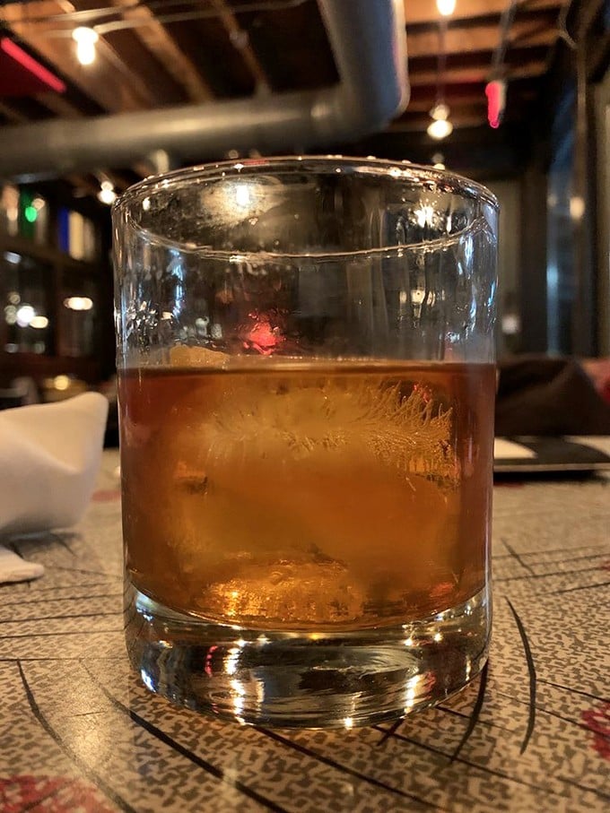 A perfectly crafted cocktail catching the light just right. Some people meditate; I prefer this form of liquid mindfulness.