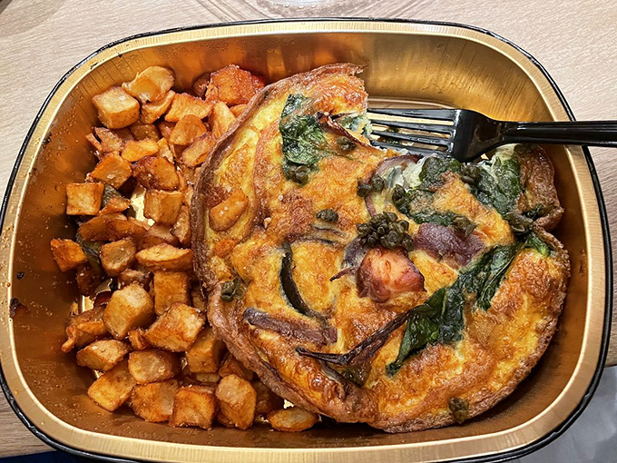 A frittata that's achieved the perfect balance of ingredients, like a well-cast ensemble where every actor gets their moment to shine.