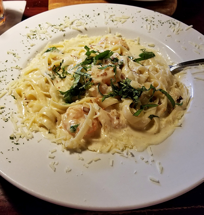 Fettuccine that doesn't just sit on the plate&mdash;it performs. Creamy sauce clinging to each strand, with fresh herbs adding pops of color and flavor.