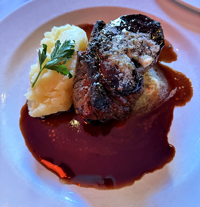 A filet mignon bathing in wine reduction that's so perfect you'll want to write it a thank-you note. Those mashed potatoes are the unsung heroes.