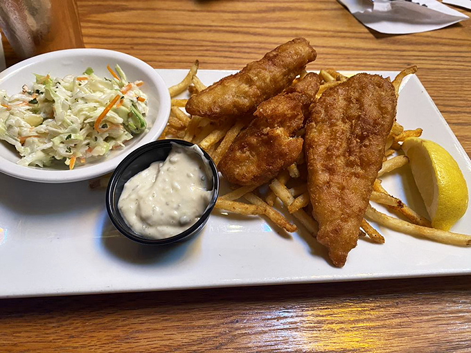 Golden-battered fish that shatters with each bite, served with fries so crisp they practically play a percussion solo on your plate.
