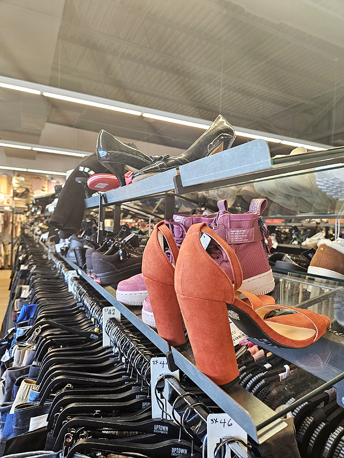 Footwear fantasies come true between these shelves. Those coral heels are practically screaming "summer cocktail party" from their perch.