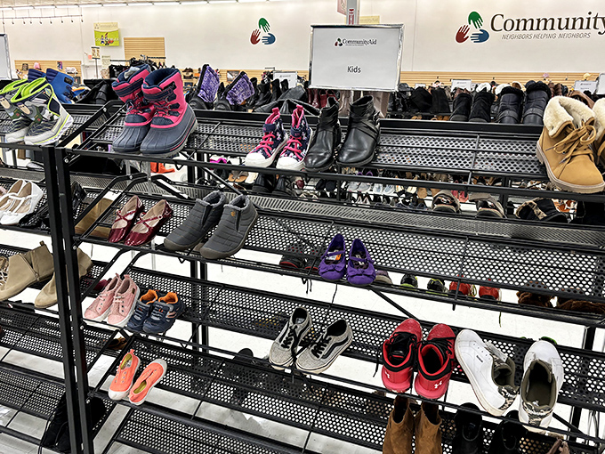 Shoes arranged with military precision, each pair ready to walk into their next chapter of adventures.