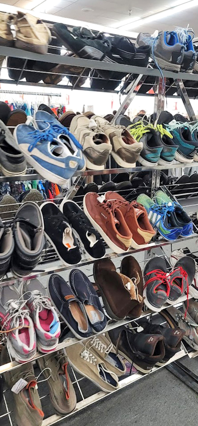 Shoes parade across wire shelves like a footwear fashion show with wallet-friendly admission.