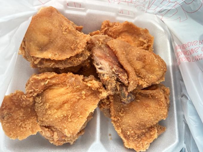 Crispy-edged, golden fried chicken that makes you understand why people willingly wait in line and why napkins were invented.