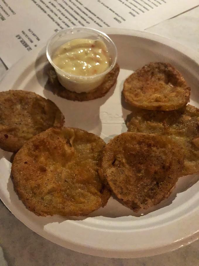 Fried green tomatoes that would make Fannie Flagg proud &ndash; crispy, tangy discs of Southern comfort served with a dipping sauce that demands to be savored.