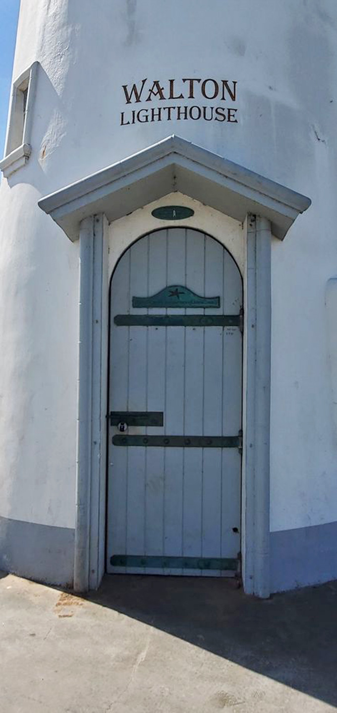 The lighthouse door &ndash; both inviting and off-limits &ndash; features nautical details that hint at the maritime heritage of this coastal sentinel. 