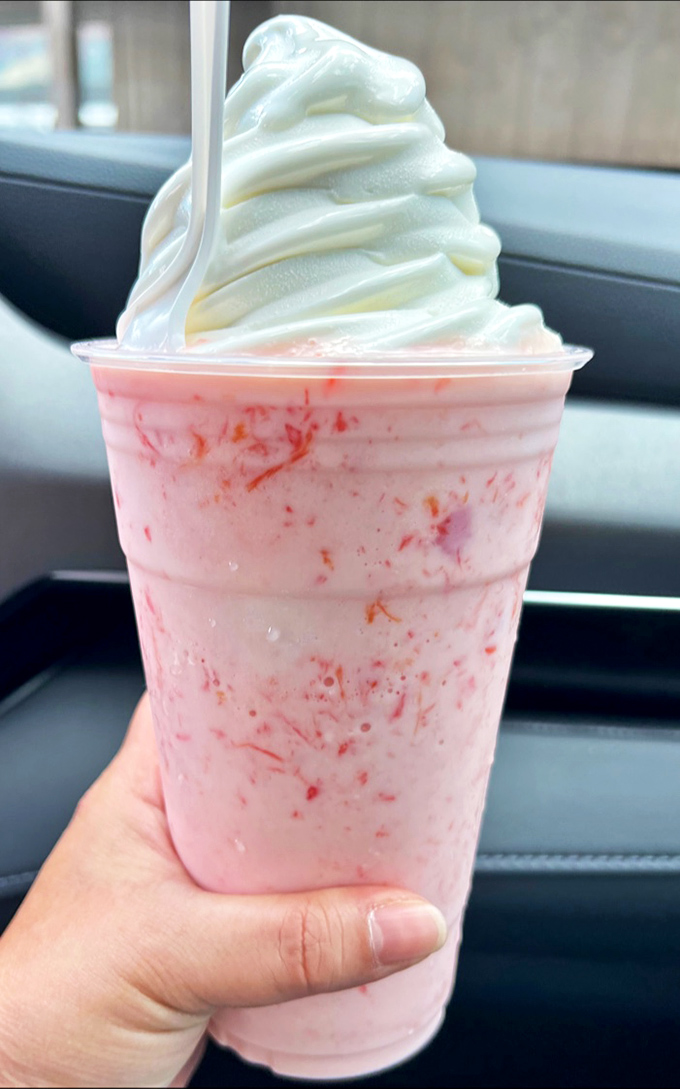 A strawberry shake so thick, the straw needs a gym membership &ndash; topped with soft-serve that defies gravity.