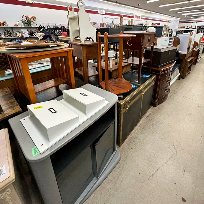 Furniture with stories to tell, waiting for your next chapter. That mid-century side table is practically begging for adoption.