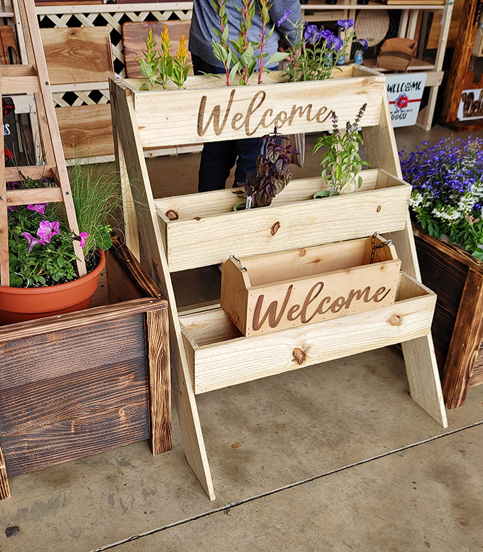 Garden planters that say "Welcome" in more ways than one. These tiered wooden beauties offer homes for flowers while brightening any porch.