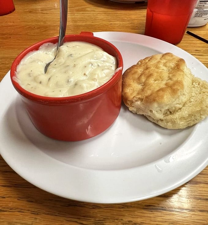 Creamy gravy served with a fluffy biscuit—comfort food that whispers, "Everything's going to be okay." Southern grandmothers everywhere would give their nod of approval.