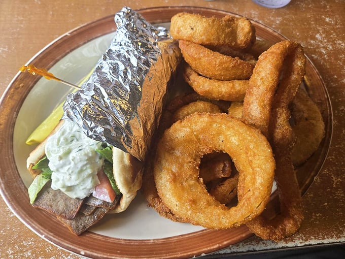 The gyro and onion rings plate that answers the eternal question: "Why choose between lunch options when you can have both?"