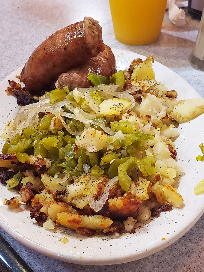 These home fries with sausage aren't just breakfast&mdash;they're edible therapy that makes Monday mornings slightly less offensive to humanity.