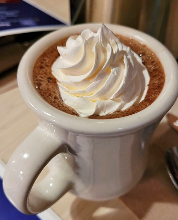 Hot chocolate elevated to an art form&mdash;where the whipped cream doesn't just top the drink, it crowns it like royalty deserves.