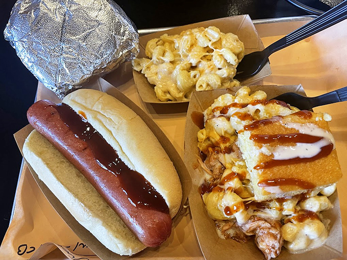 Even the humble hot dog gets the royal treatment here, nestled in a soft bun and ready to join the mac and cheese in your happy dance.