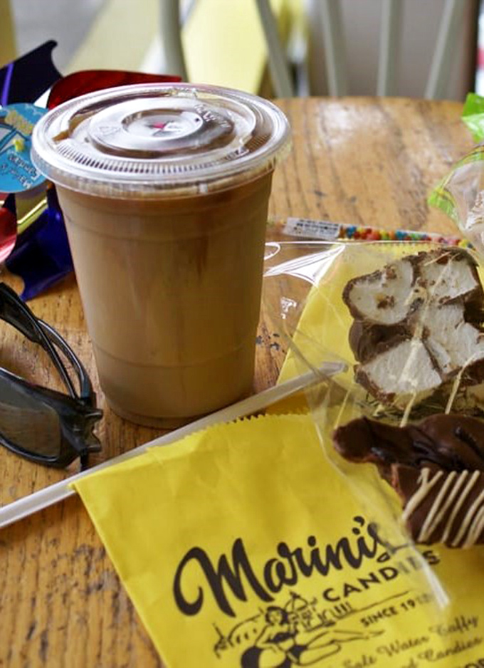 Coffee and chocolate—proof that Marini's understands the adult version of happiness comes in a cup with a side of wrapped indulgence.