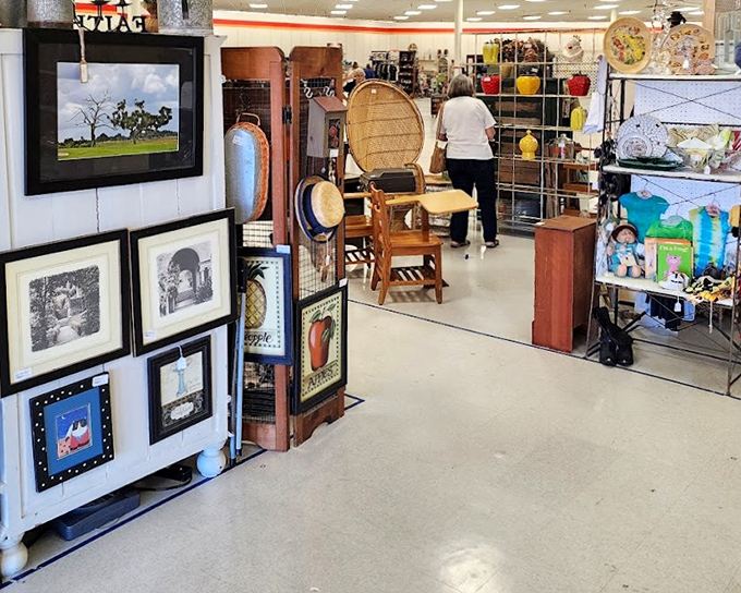 Framed artwork and wicker chairs create the perfect browsing path &ndash; like a museum where everything's actually for sale.