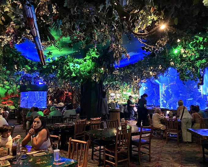 Blue lighting transforms ordinary dining into underwater fantasy&mdash;like eating inside an aquarium without the guilt of the fish watching you eat their friends.
