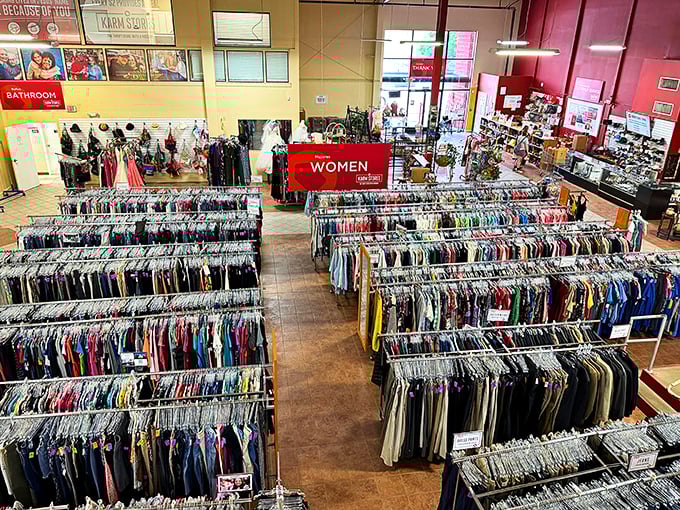 The women's section stretches toward the horizon like a rainbow of fabric possibilities, each rack a new adventure waiting to be discovered.