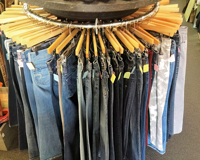 Denim dreams hang in circular formation &ndash; each pair of jeans representing someone's "maybe someday I'll fit into these again" hopes.