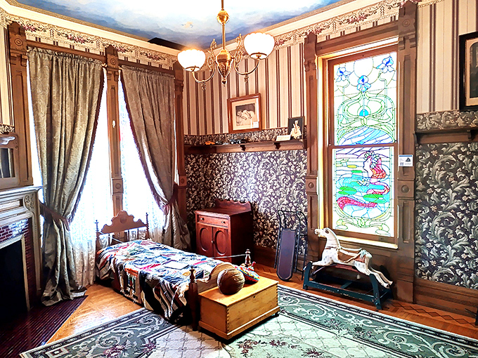 A child's room that puts modern nurseries to shame. That stained glass window would have made even the timeout corner feel magical.