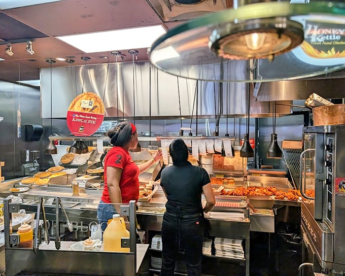 Where the magic happens. The open kitchen reveals the choreographed dance of frying perfection that transforms simple ingredients into edible art.