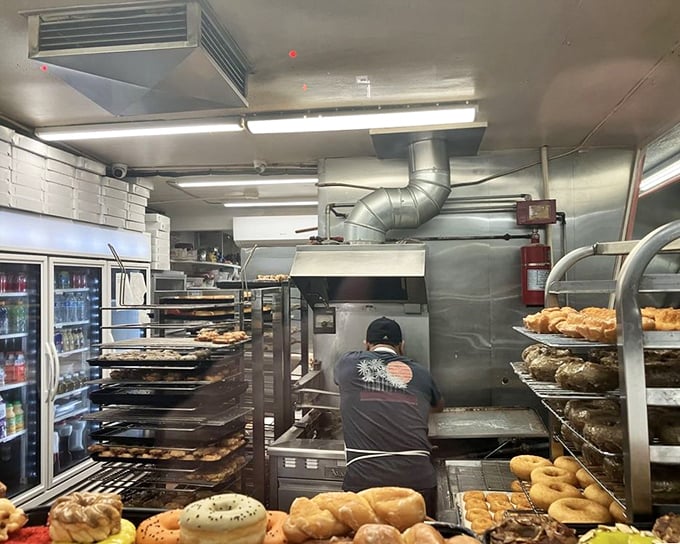 The kitchen reveals the alchemy of donut-making in progress. Like watching a backstage Broadway production, but with more sugar.