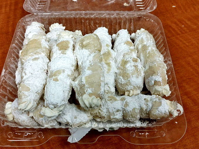 Lady locks dusted with powdered sugar like tiny pastry snowballs filled with sweet dreams inside.