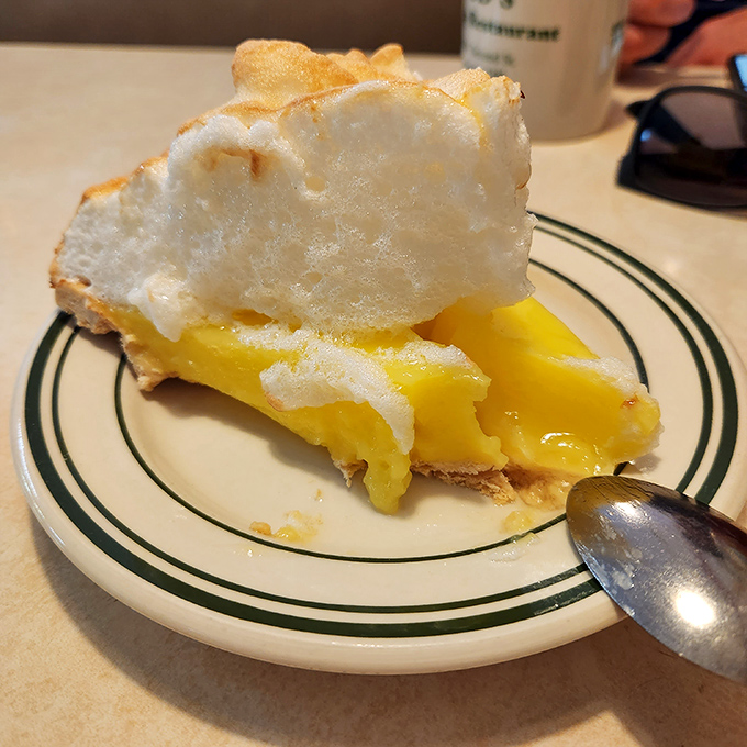 Lemon meringue pie with a cloud of sweet meringue floating above tangy lemon filling&mdash;proof that heaven exists and it's on a plate at Bud's.