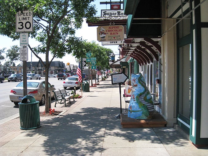 Downtown sidewalks lined with colorful planters and quirky dinosaur statues&mdash;because nothing says "Alpine Village" quite like prehistoric reptiles.