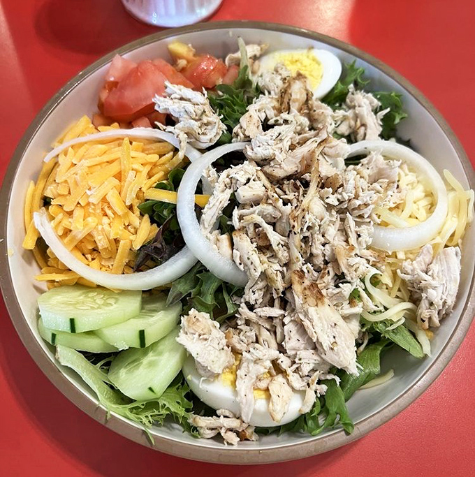 Fresh, vibrant, and colorful&mdash;this salad proves that healthy eating doesn't have to be punishment, especially with that perfectly seasoned chicken on top.